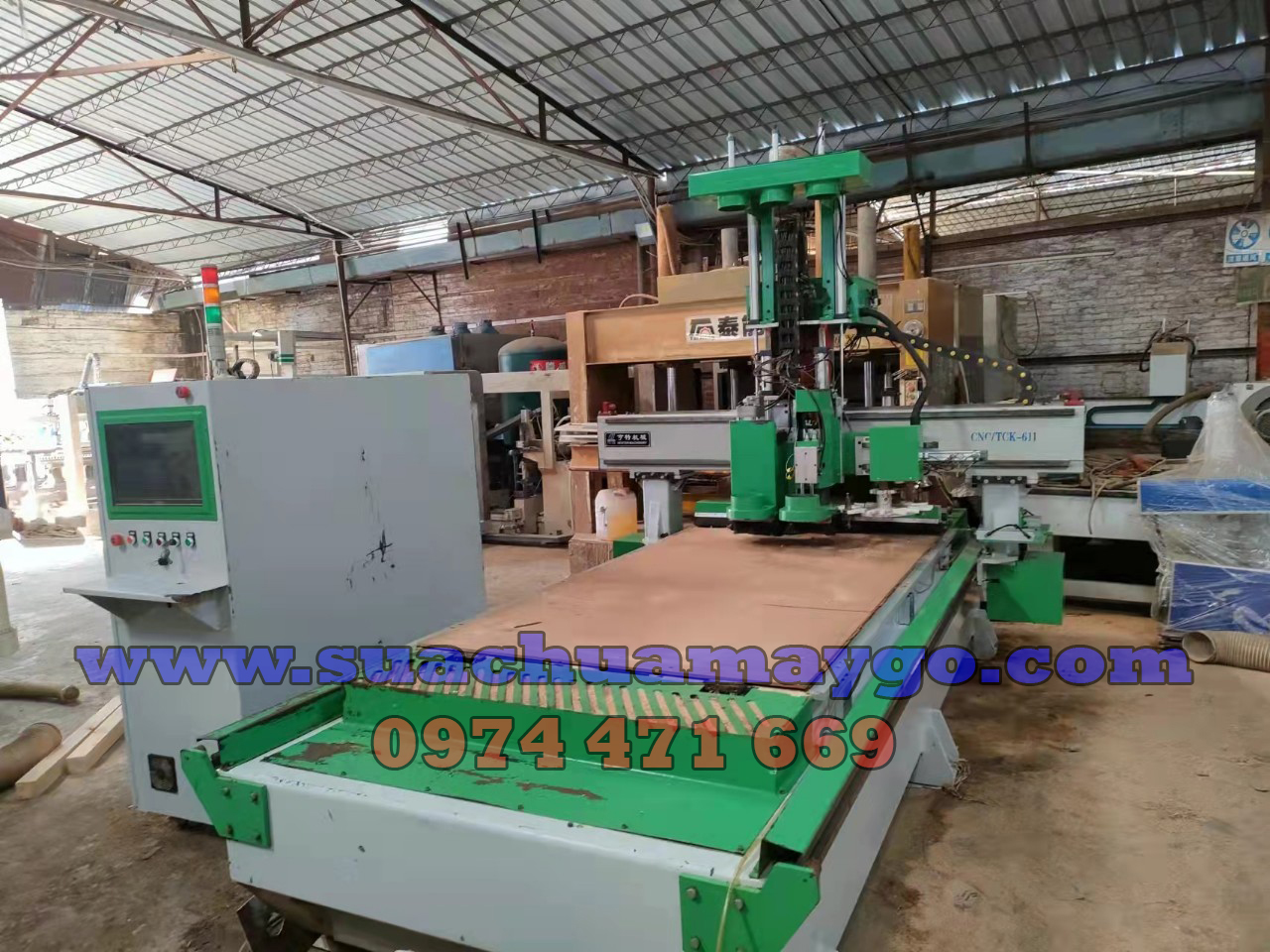 Q12 chuyên bán máy router cnc 2 đầu thay dao tự động chất lượng